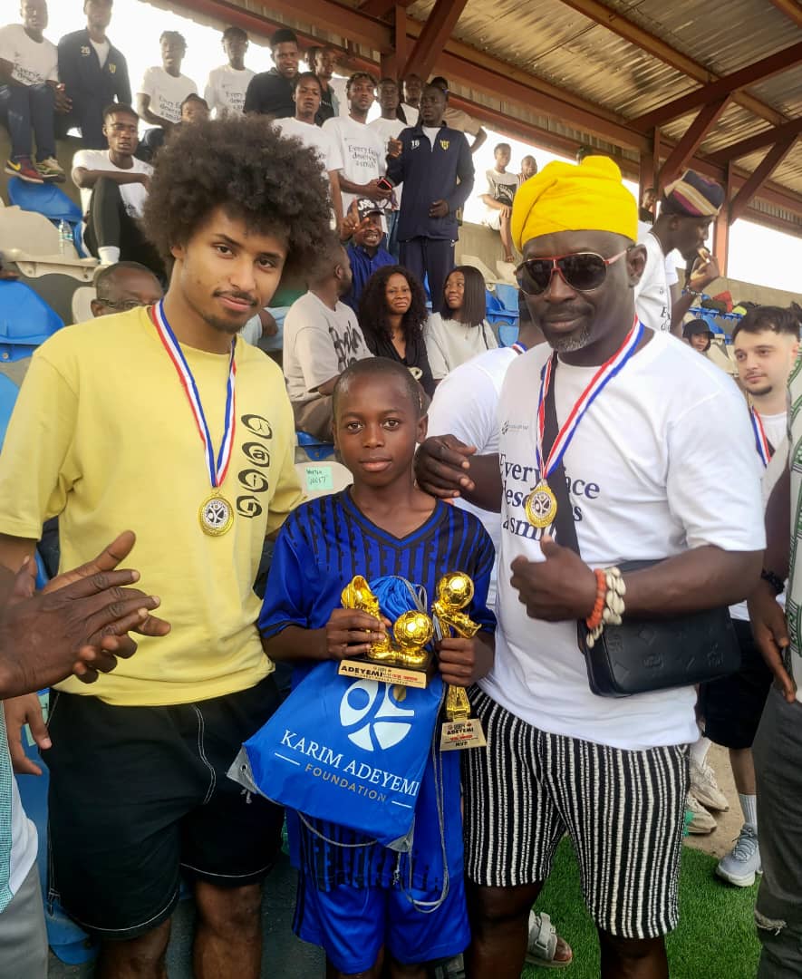 MVP, top scorer Ibrahim Abolade flanked by Karim Adeyemi and his father